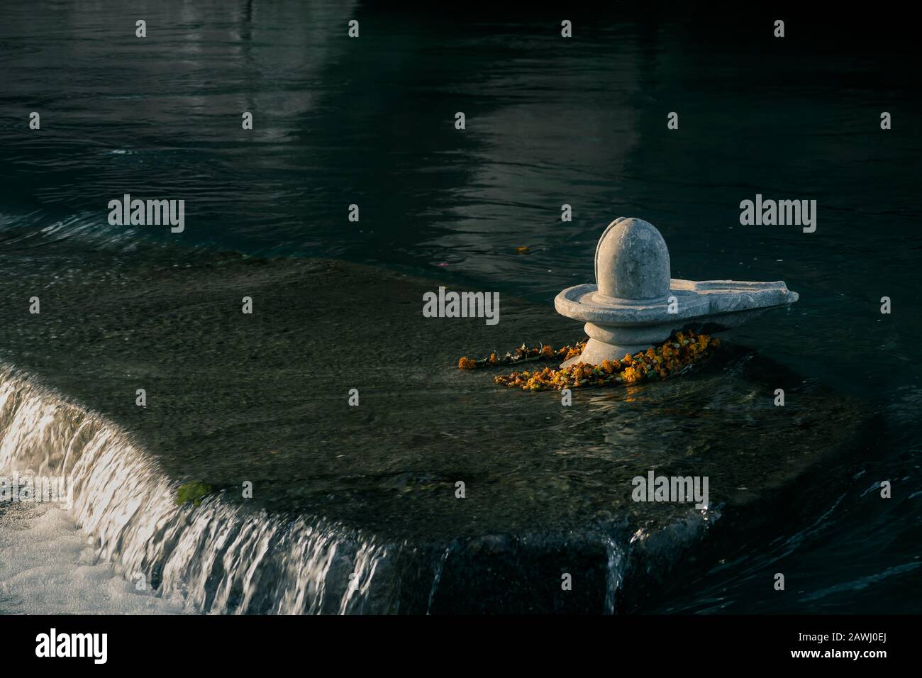 Shivling in the middle of river Ganga in India Stock Photo - Alamy