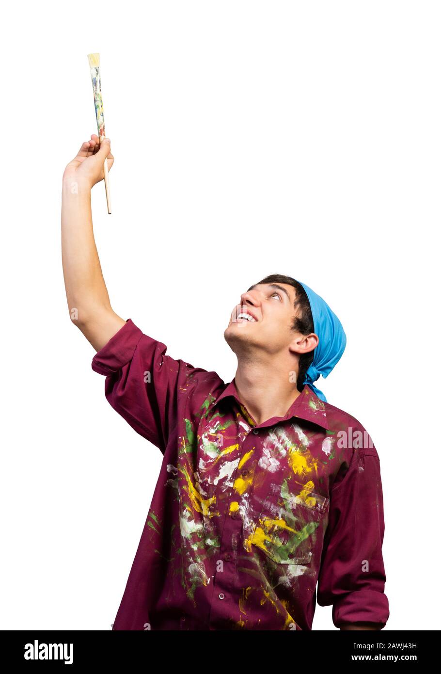 Smiling young painter artist pointing upwards Stock Photo - Alamy