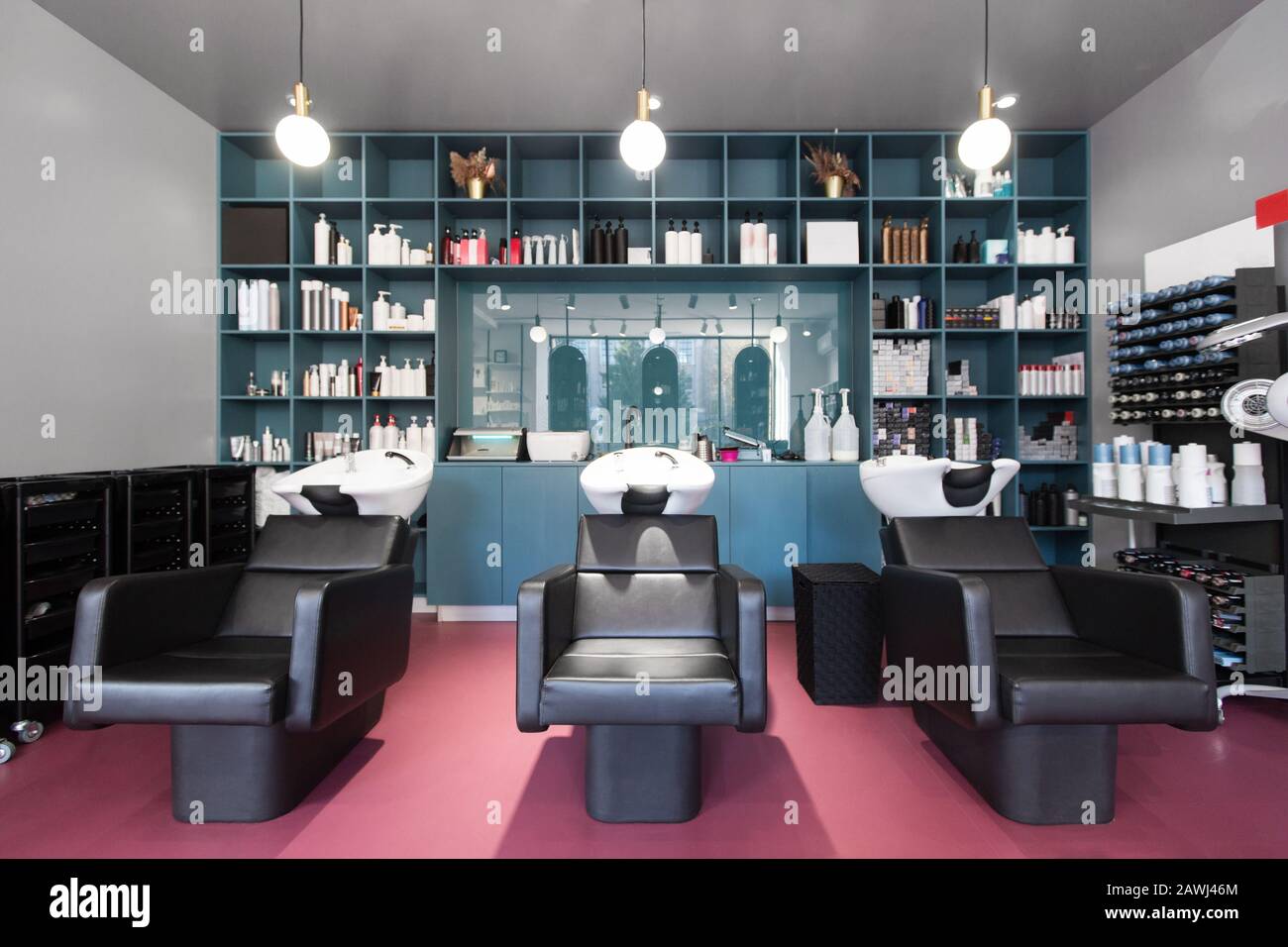 Professional use only cosmetics for hair on shelves Stock Photo - Alamy