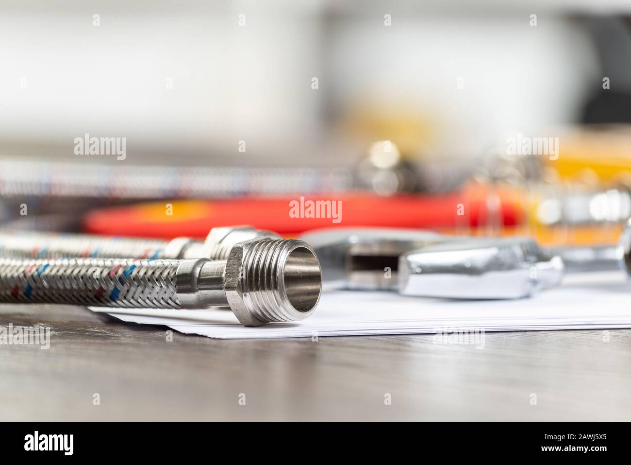 Water braided hose with connecting internal screw Stock Photo - Alamy