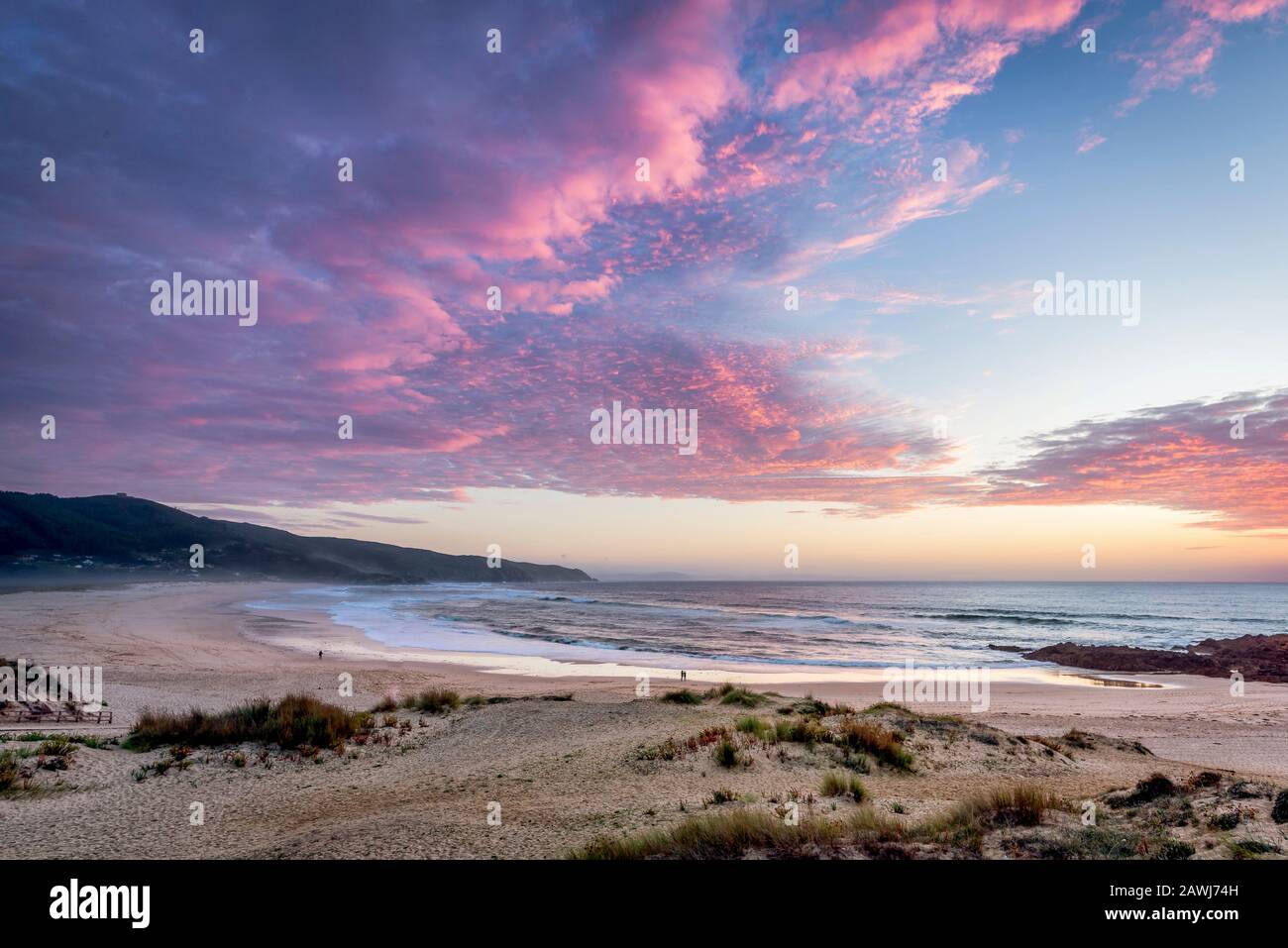 Sunset on a beach on the coast of Galicia Stock Photo - Alamy