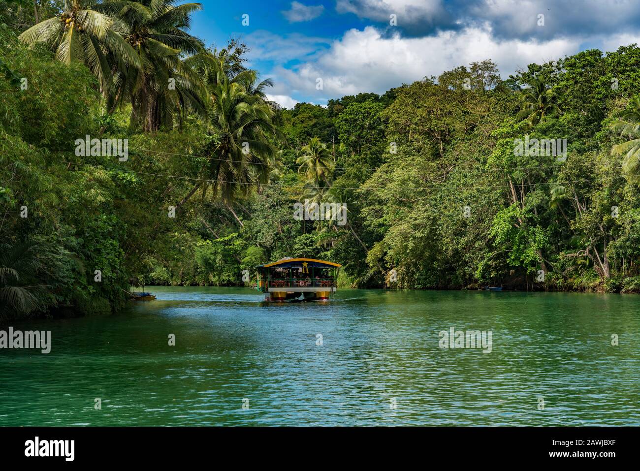 Cruise ship on the Loboc River is a river in the Bohol province of the ...