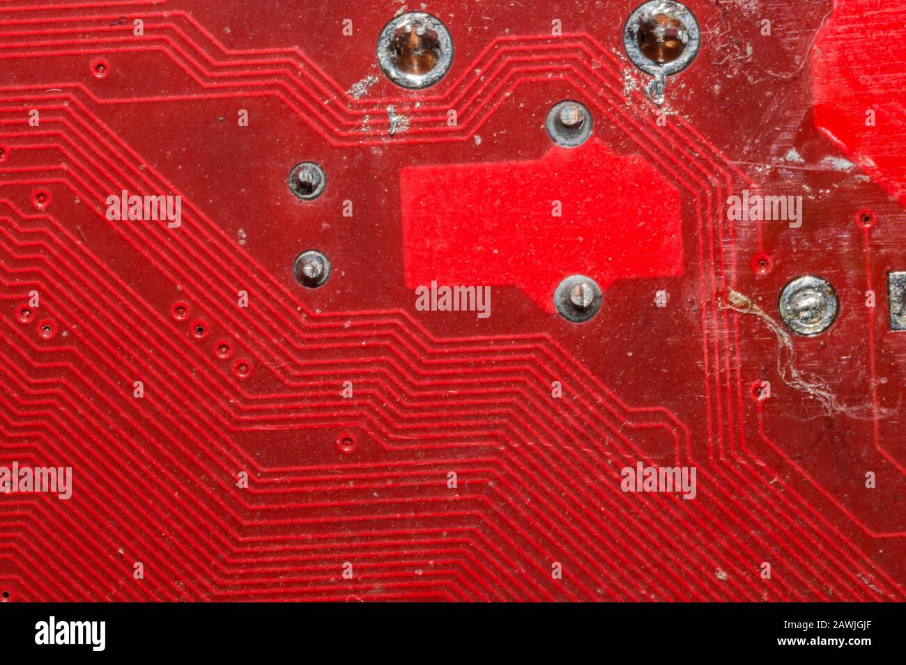 Spoiled motherboard close up. circuit board with dust and defects ...