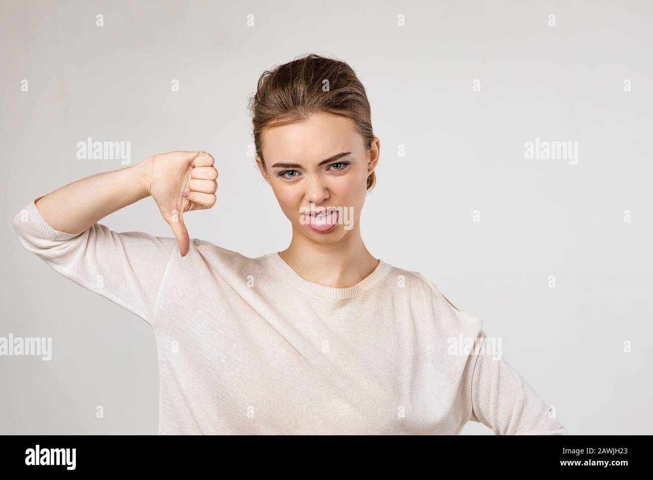 Woman gesture looking down face hi-res stock photography and images - Alamy