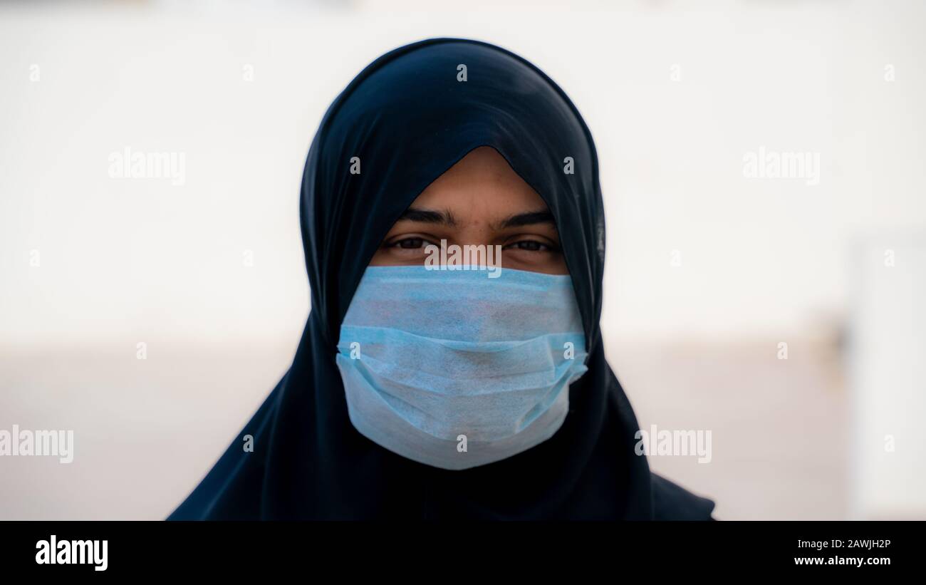 Muslim Woman With Face Mask High Resolution Stock Photography and ...