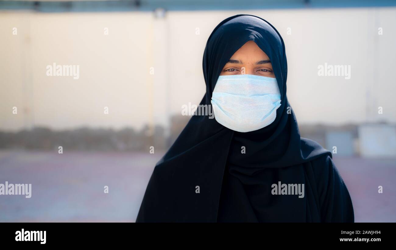 Muslim Woman With Face Mask High Resolution Stock Photography and ...