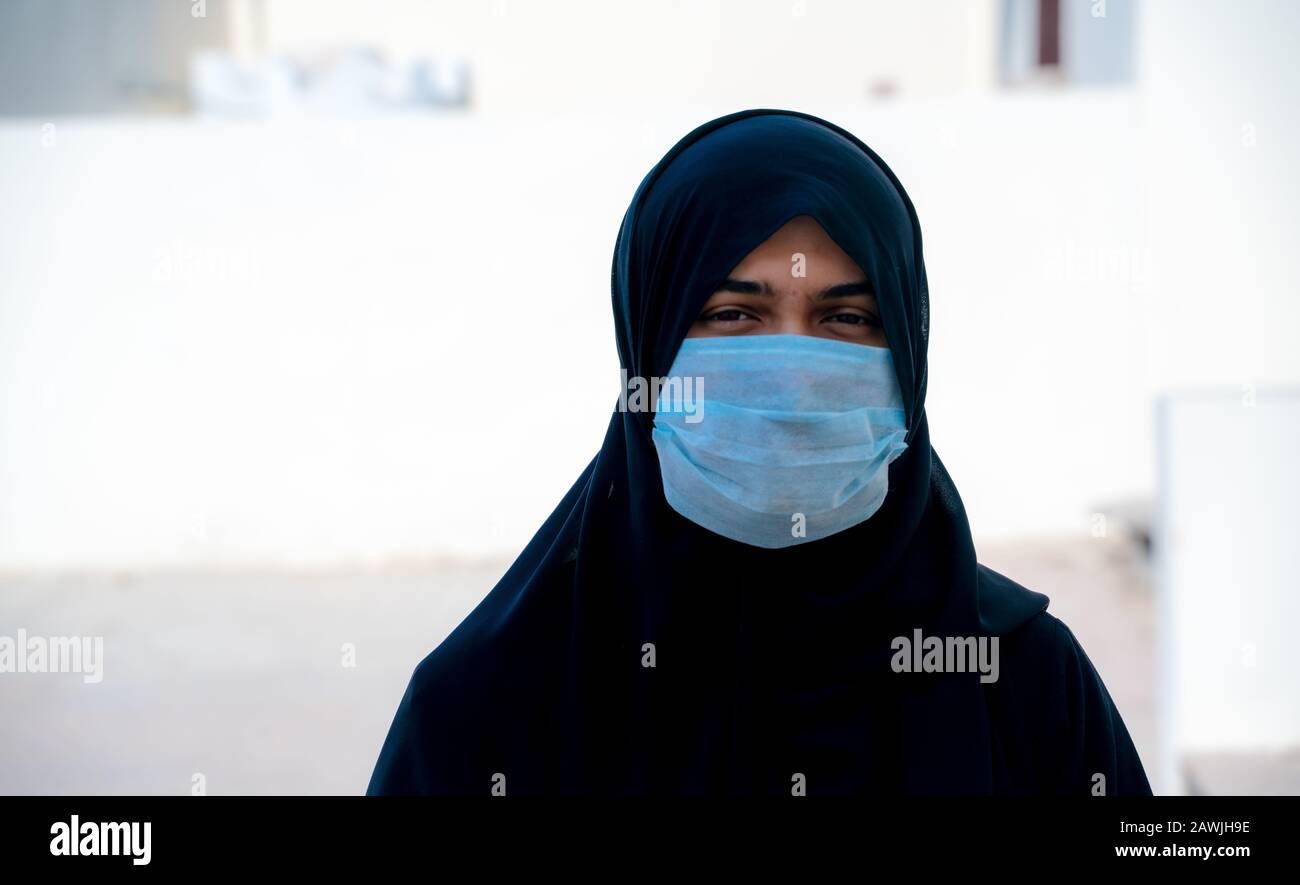 Muslim women wearing mask hi-res stock photography and images - Alamy