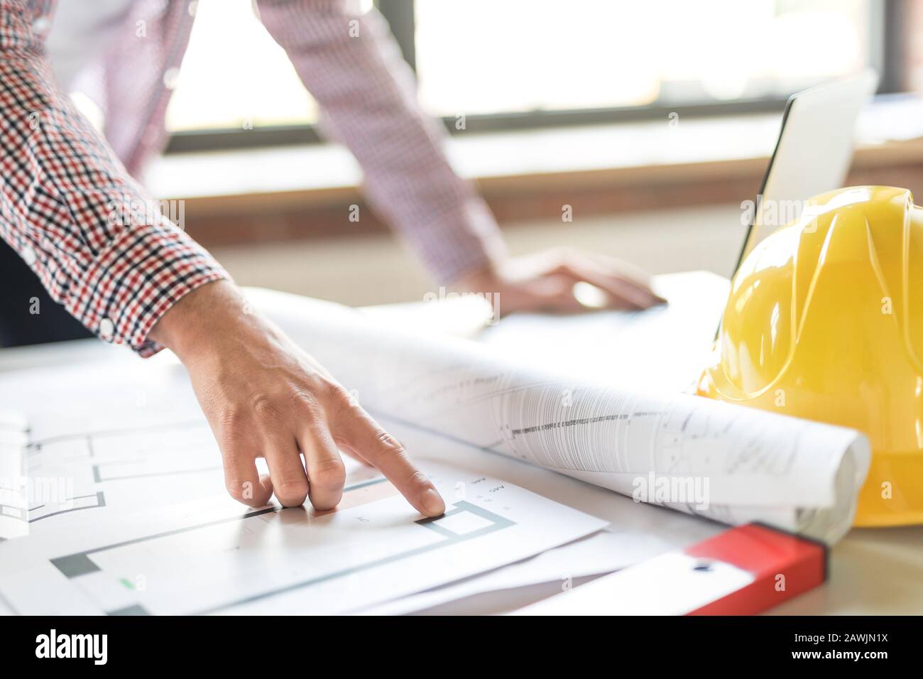Engineer working house blueprints construction hi-res stock photography ...