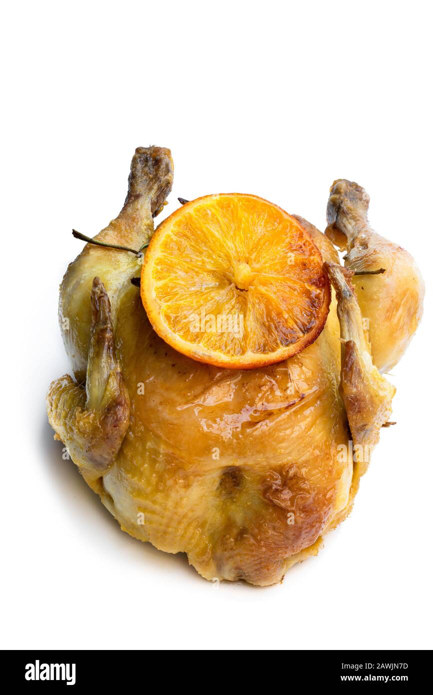Roasted poussin with orange and rosemary isolated on white Stock Photo ...