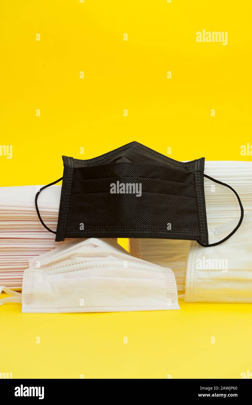 Surgical masks of various colors to protect against viruses, flu and ...