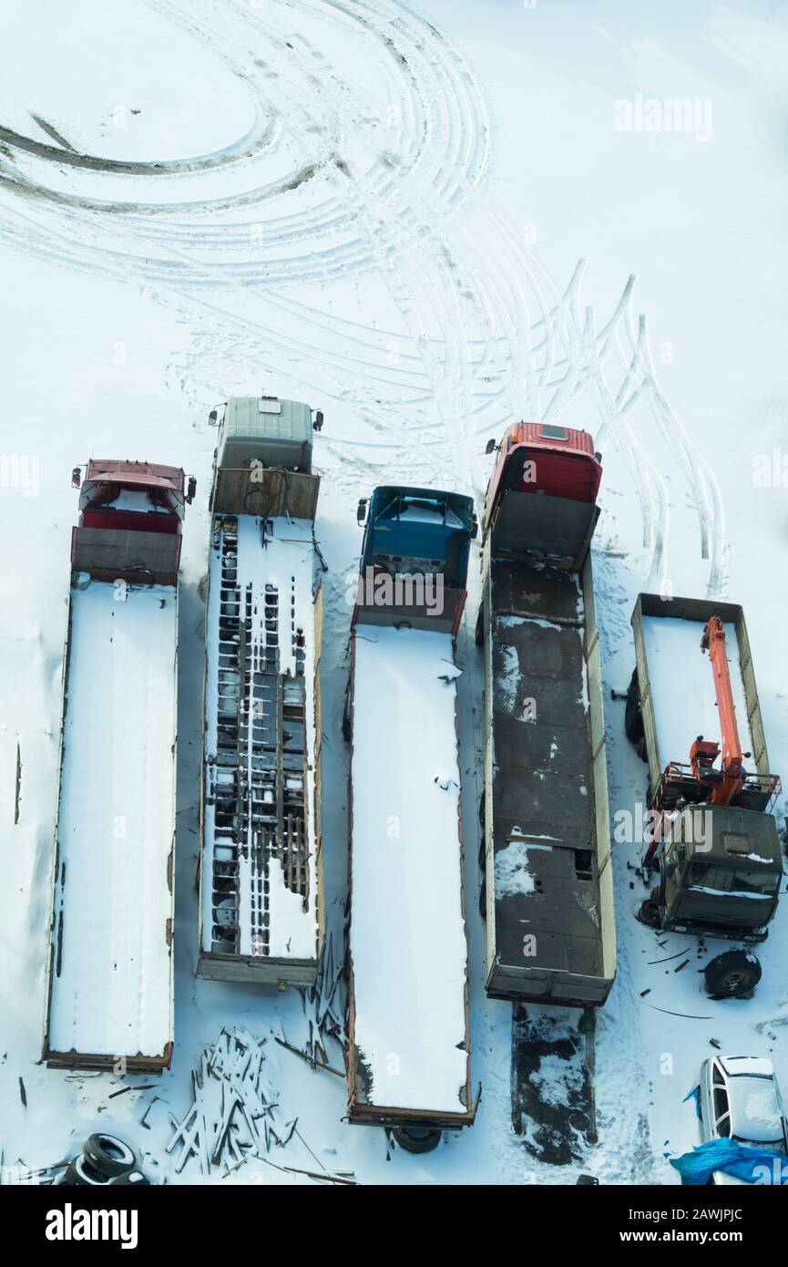 Truck under the snow. lorry covered with snow after snowfall. long ...