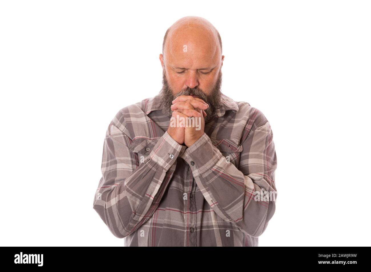 Hands folded in prayer hi-res stock photography and images - Alamy