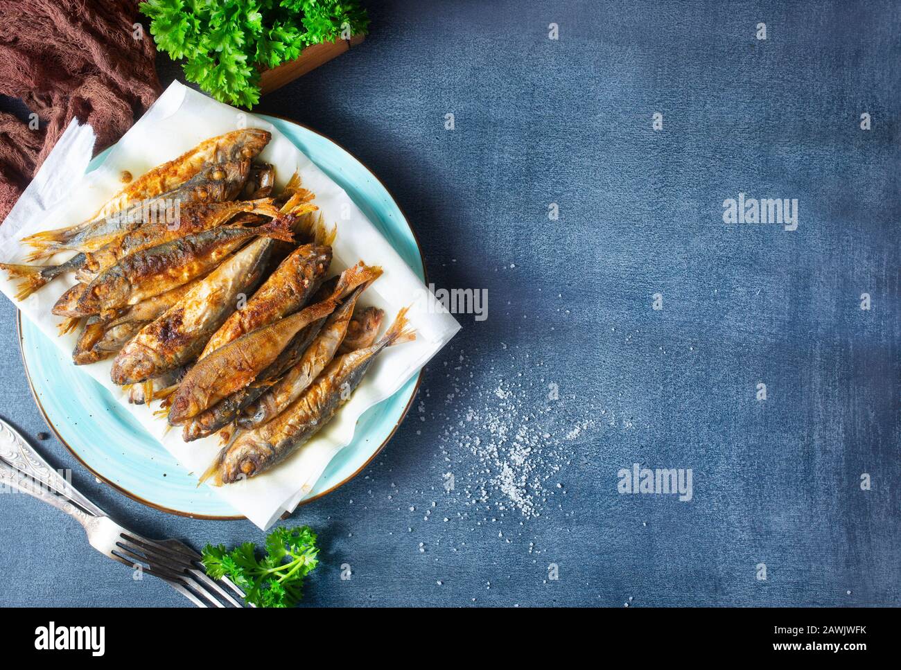 fried fish salt and spice, fish on plate Stock Photo - Alamy
