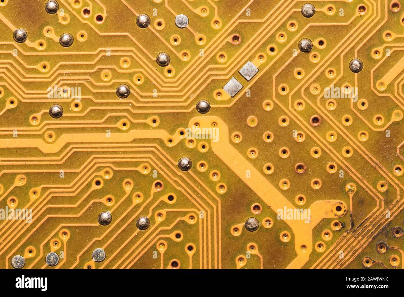 Burnt circuit board abstract background. spoiled motherboard close up ...