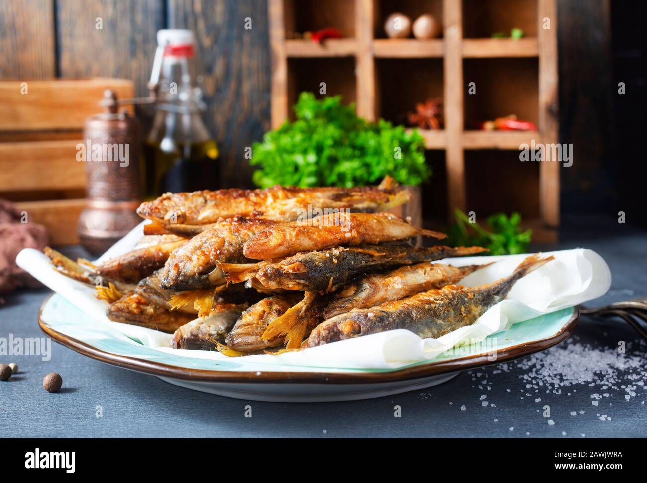 fried fish salt and spice, fish on plate Stock Photo - Alamy