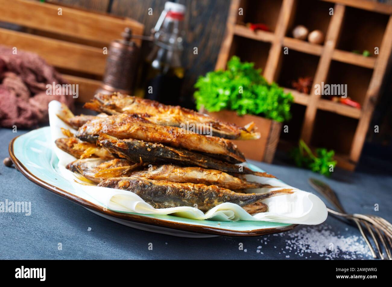fried fish salt and spice, fish on plate Stock Photo - Alamy