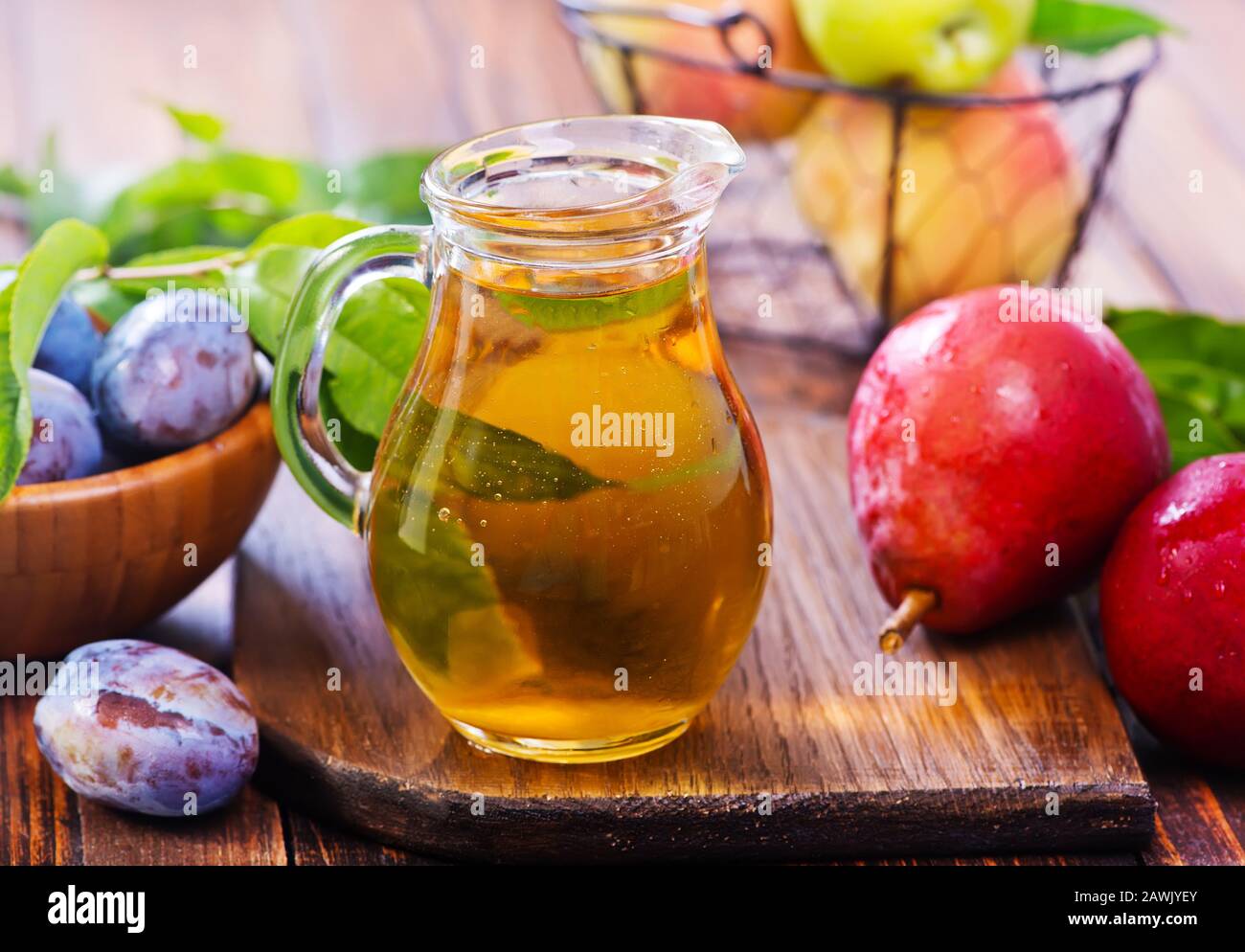compot in glass jug and on a table Stock Photo - Alamy