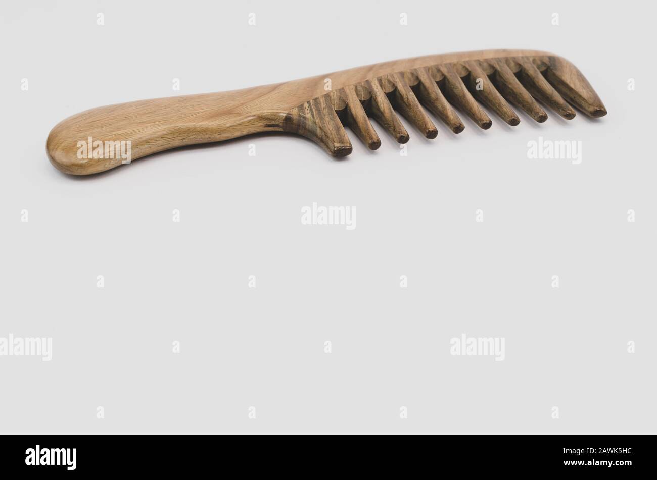 sandalwood shaving comb on a white surface top perspective Stock Photo ...