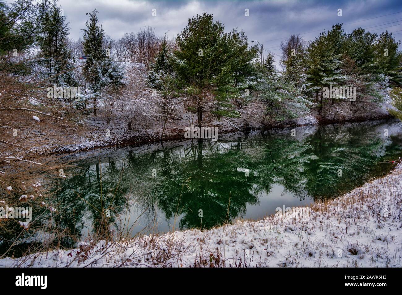 Winter scene of a pond Stock Photo - Alamy