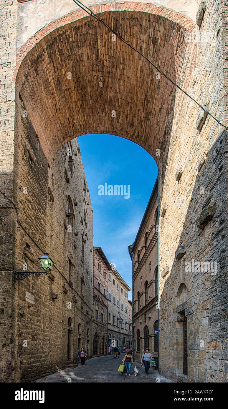 Italy Tuscany Volterra - Arch and vault next to the house / tower in ...
