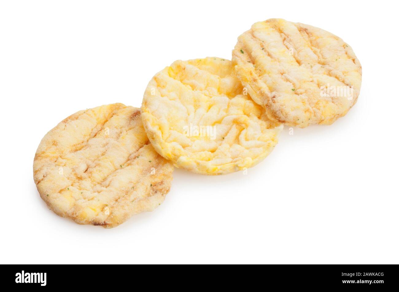 Studio shot of circular corn crisps cut out against a white background ...