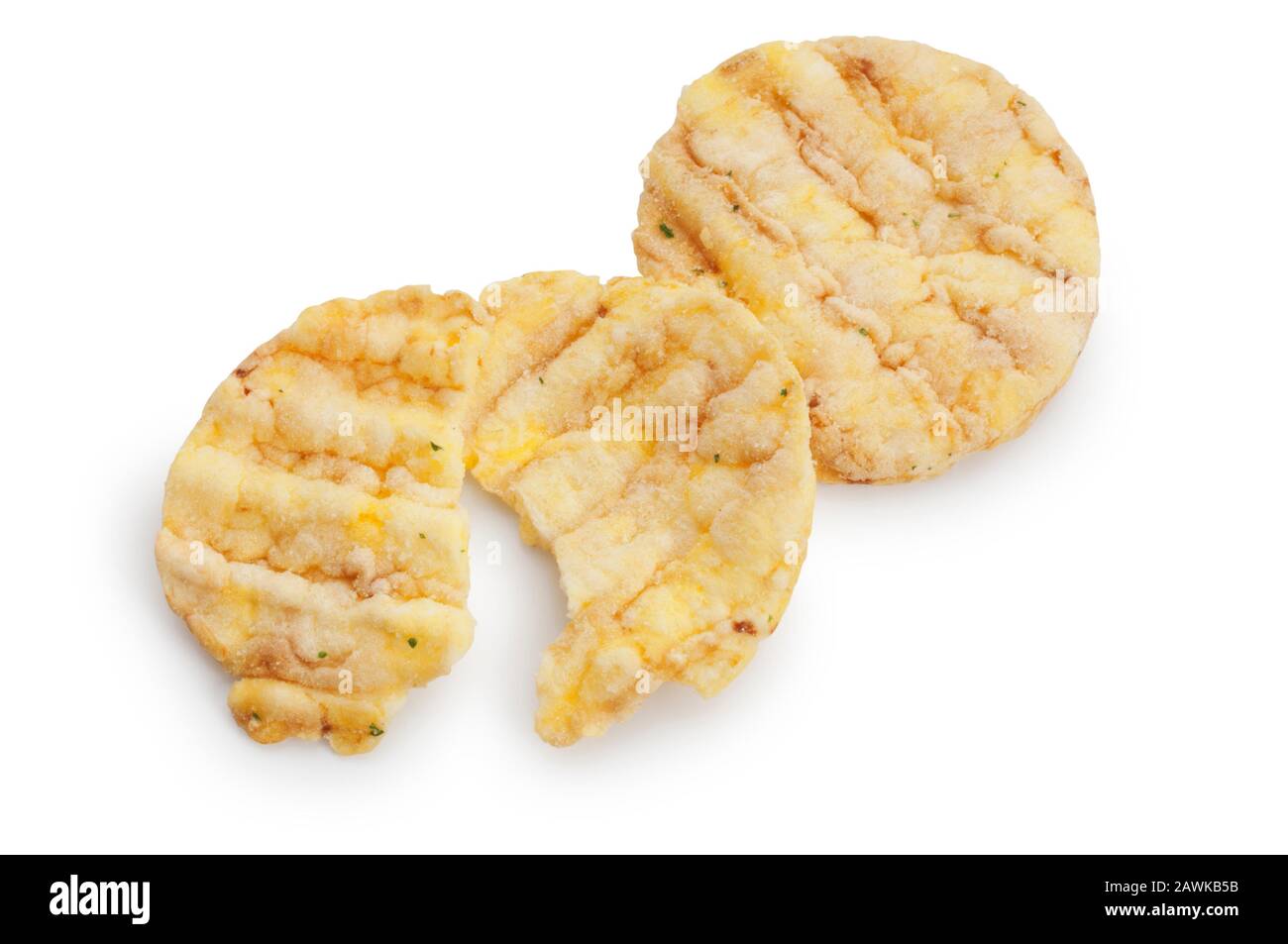 Studio shot of circular corn crisps cut out against a white background ...