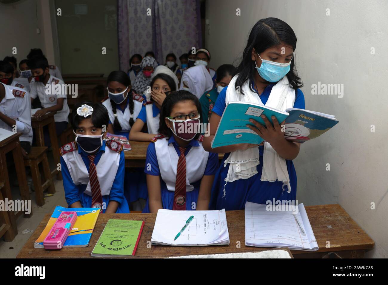 covid 190 Feb 2020 Children at Cambridge school in Dhaka seen wearing mask to protect themselves ...
