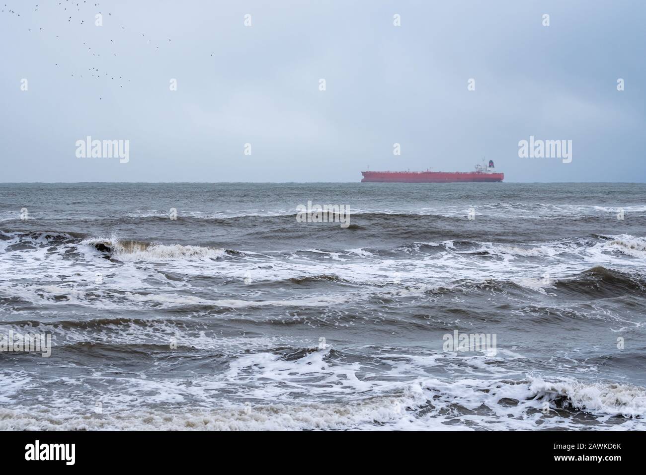 Tanker ship at sea during a storm Stock Photo - Alamy