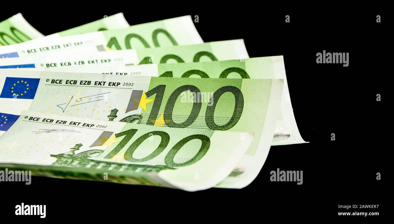 100 Euro - full set of banknotes of euro isolated on black Stock Photo ...