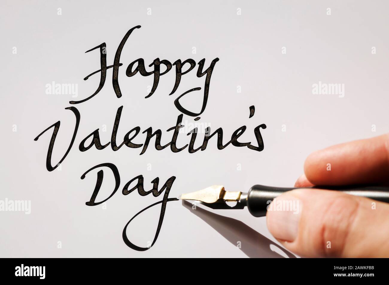 Happy Valentine's Day message handwritten with a calligraphy pen on ...