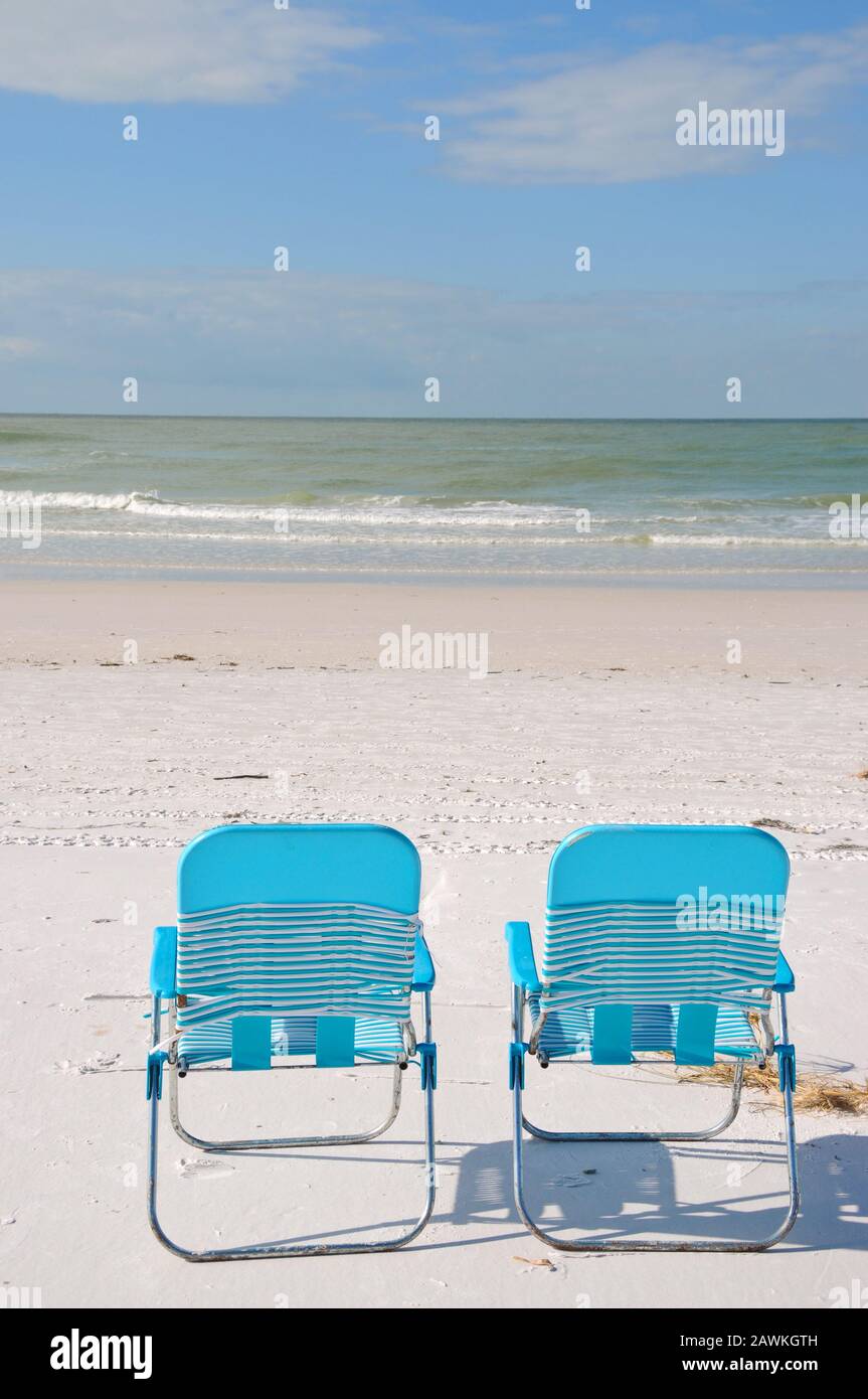 Lounge Chairs on the Beach Stock Photo - Alamy