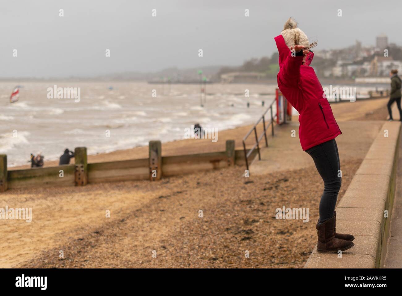 Person Walking In The Wind