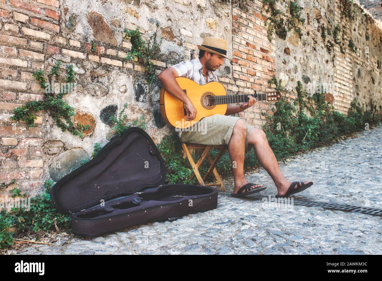 Guitar player busking busker street hi-res stock photography and images ...