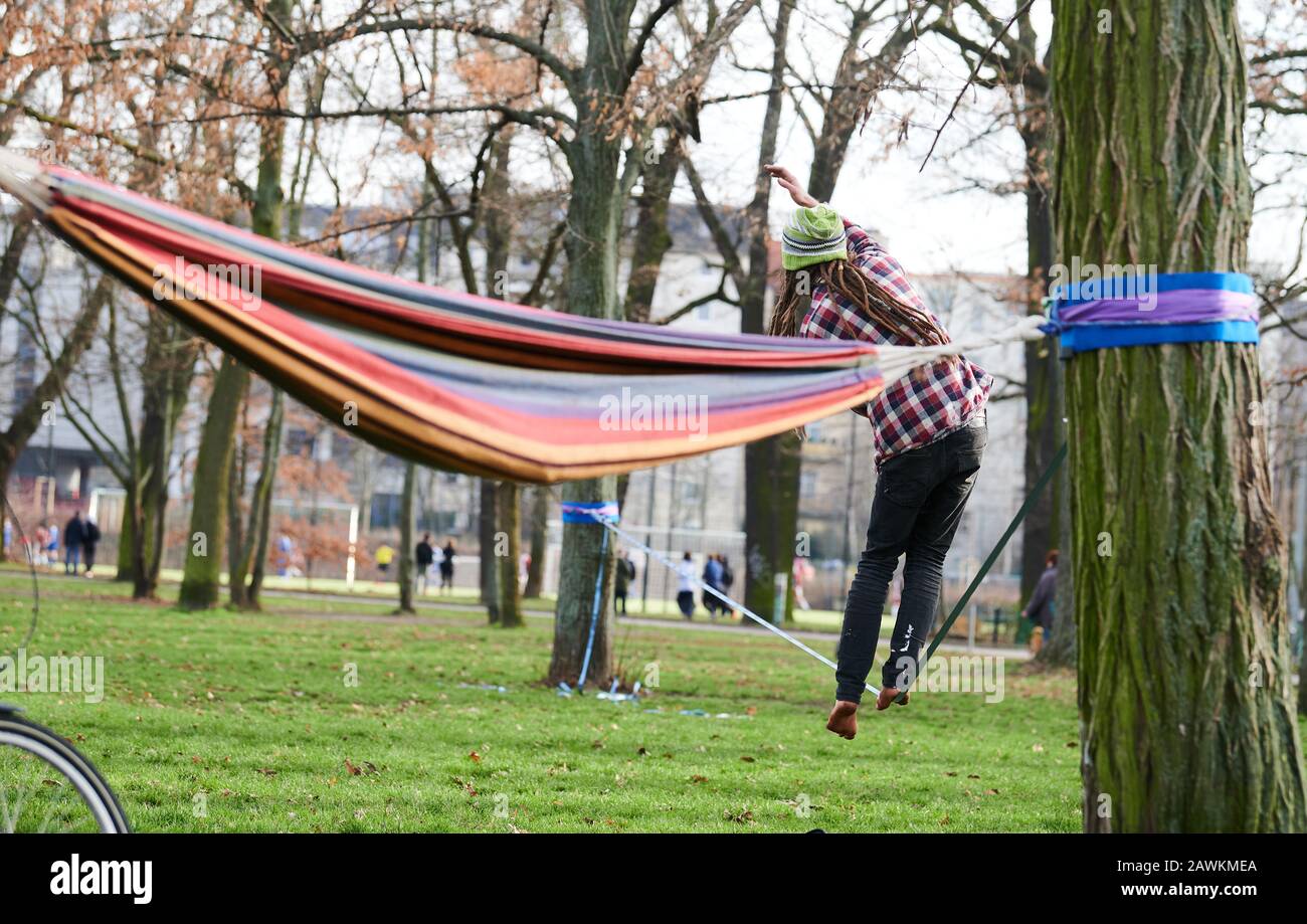 Berlin, Germany. 09th Feb, 2020. A man balances on a slackline in the ...