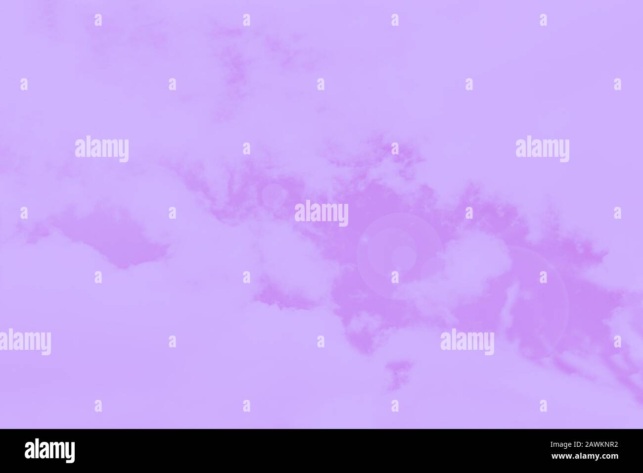 Purple violet sky background with clouds and sun glare, toned Stock ...