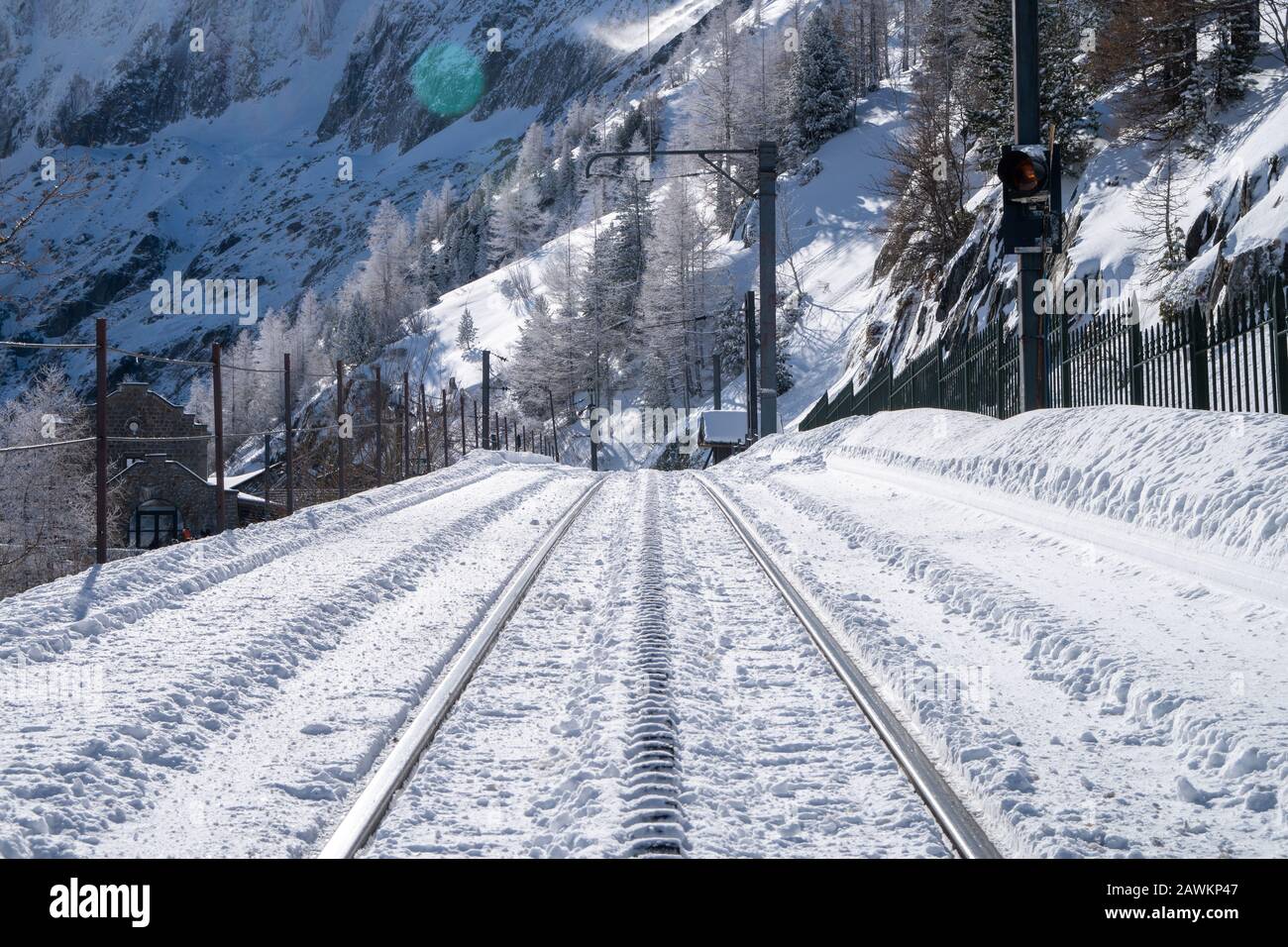 Train tracks running up the mountains In Chamonix France Stock Photo ...