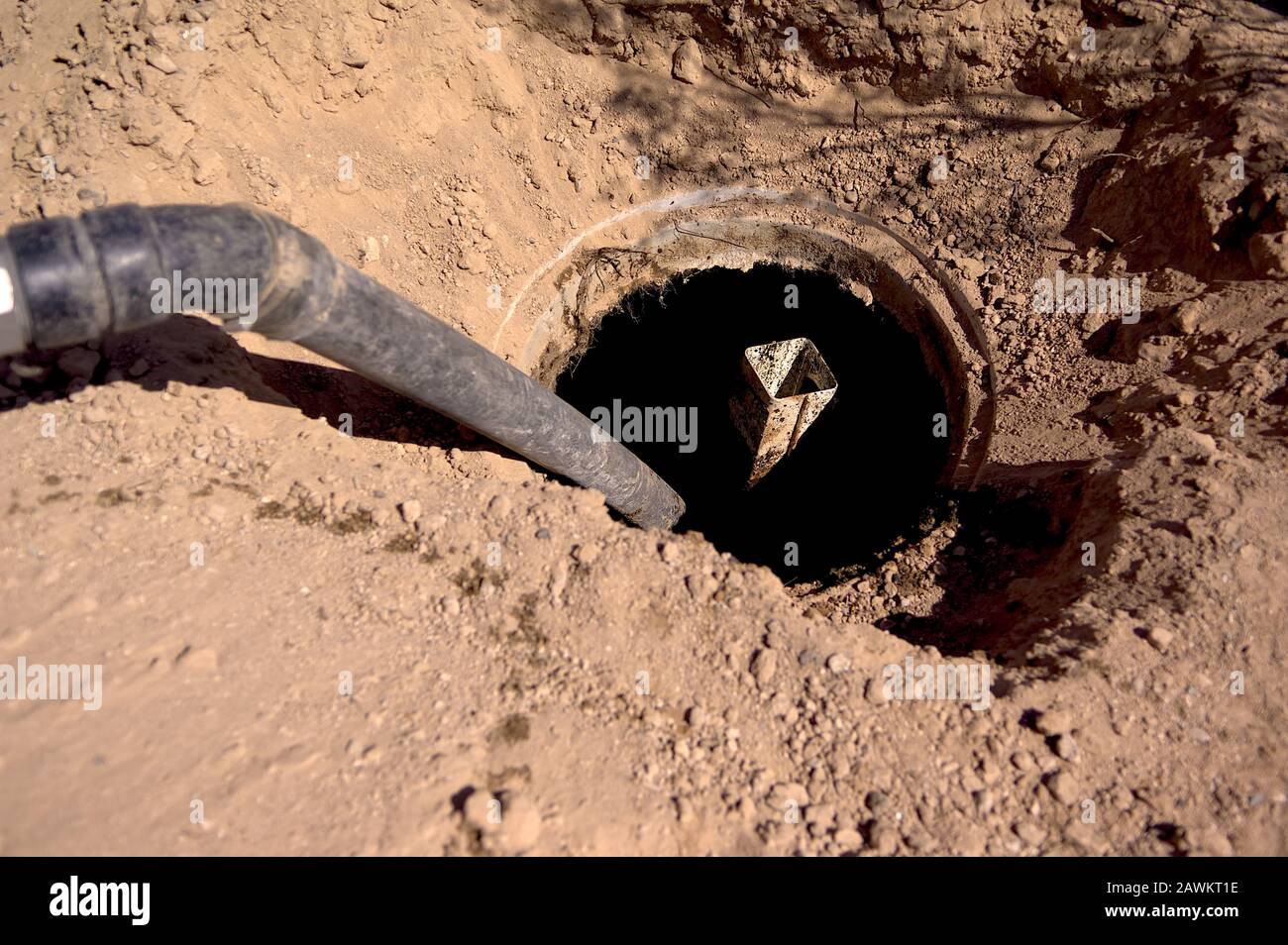 A septic tank having the waste within it pumped out Stock Photo - Alamy