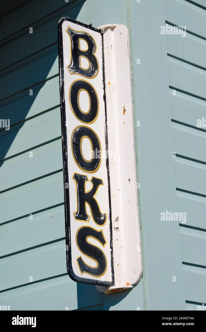 Weathered Books sign outside of a bookstore Stock Photo - Alamy