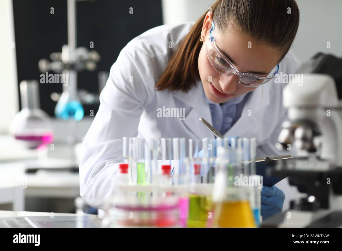 Modern experiments with chemicals in laboratory Stock Photo - Alamy