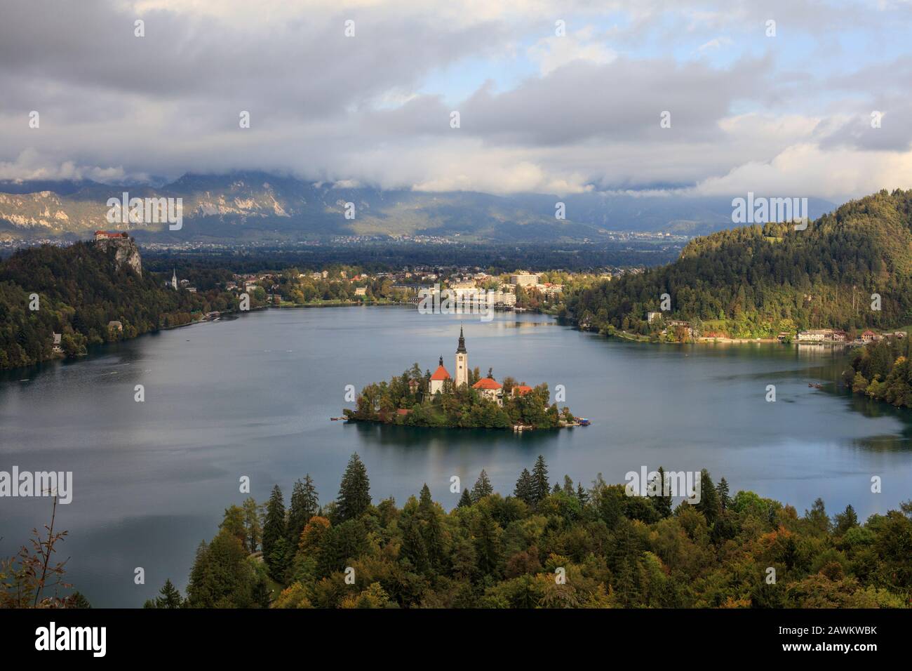 Lake Bled view with the church standing on an island in the middle and ...