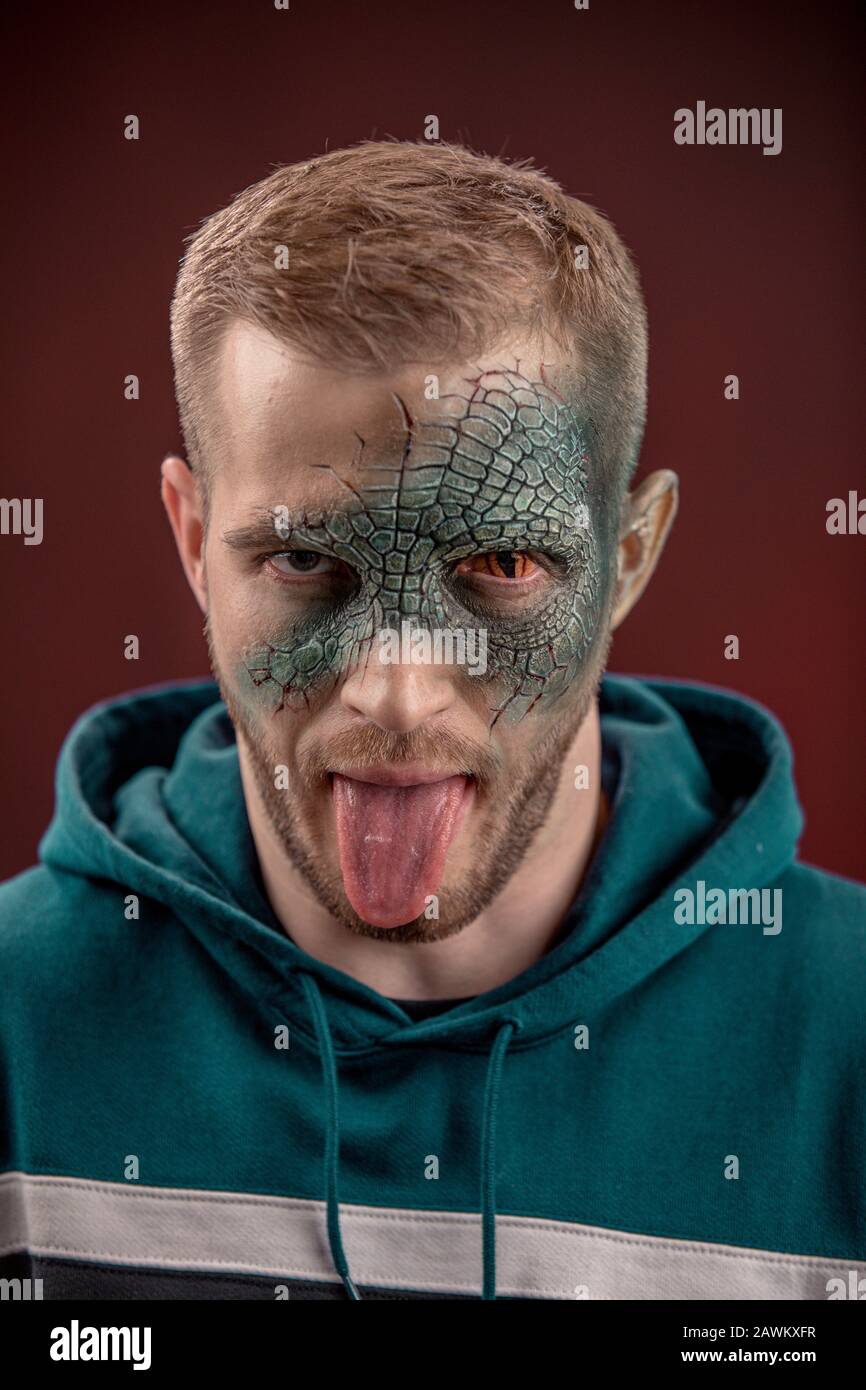 Man with snake tongue hi-res stock photography and images - Alamy