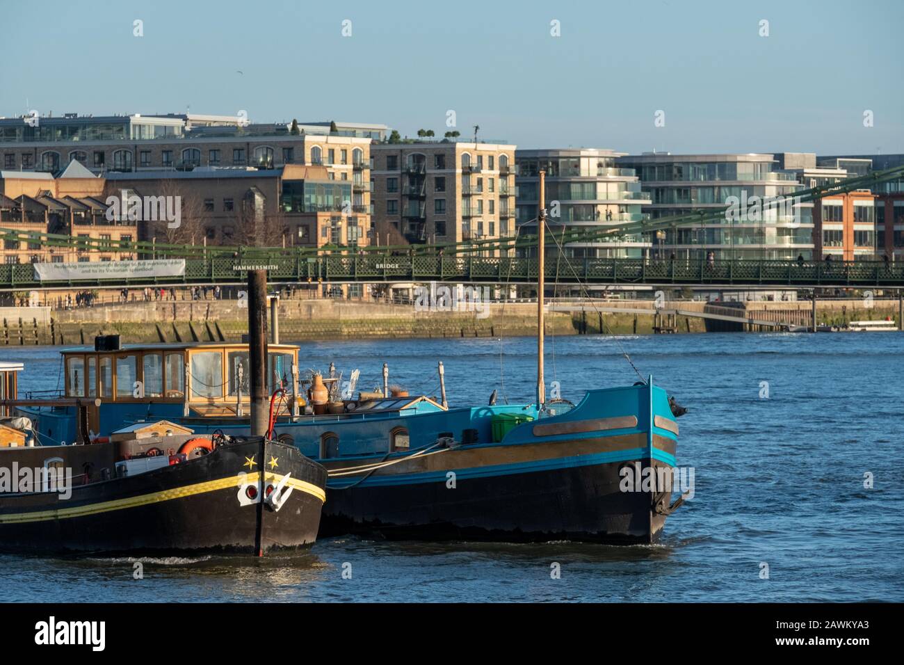 Boats on the River Thames in the foreground. In the background ...