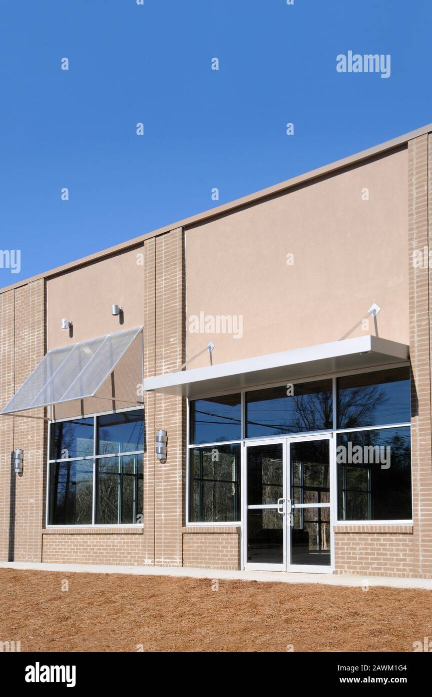 New Commercial Building with Office and Retail Space Stock Photo - Alamy