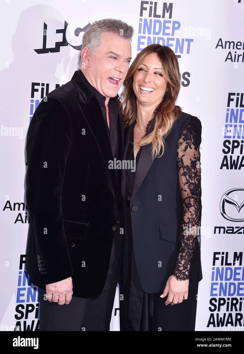 SANTA MONICA, CA - FEBRUARY 08: Ray Liotta (L) and Jacy Nittolo attend ...
