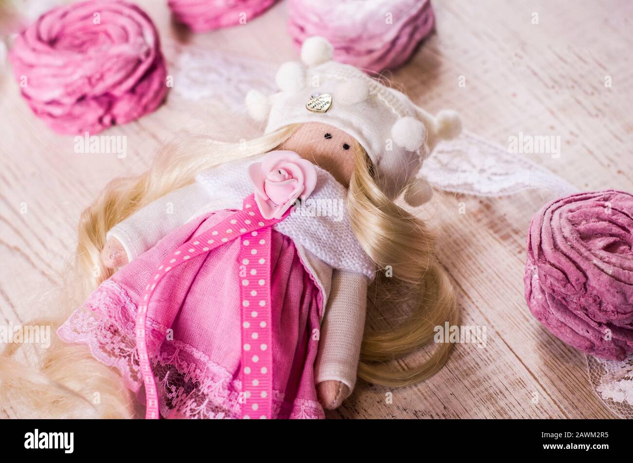 Cute handmade doll with pink marshmallows. Gentle girl photo Stock ...