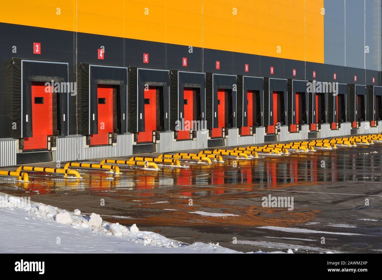 Front view of loading docks of a modern logistics center. Logistics ...