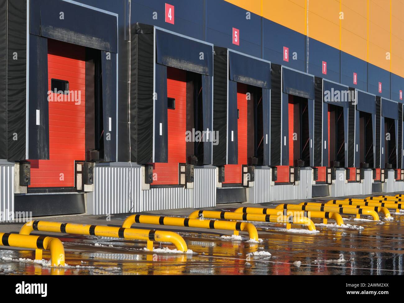 Front view of loading docks of a modern logistics center. Logistics ...