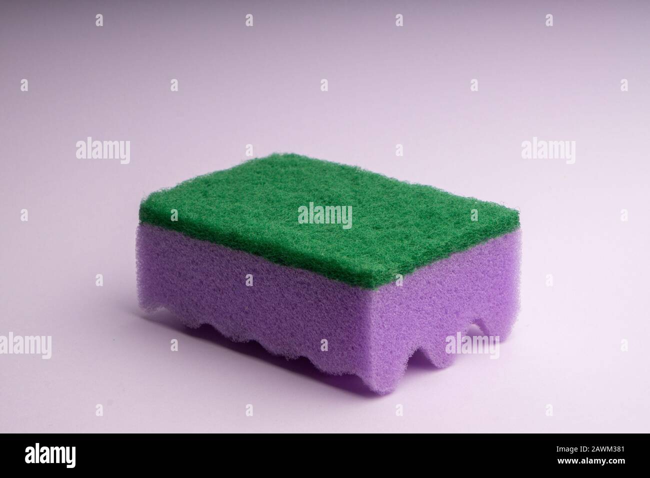 Purple foam sponge for washing dishes on a white background Stock Photo ...