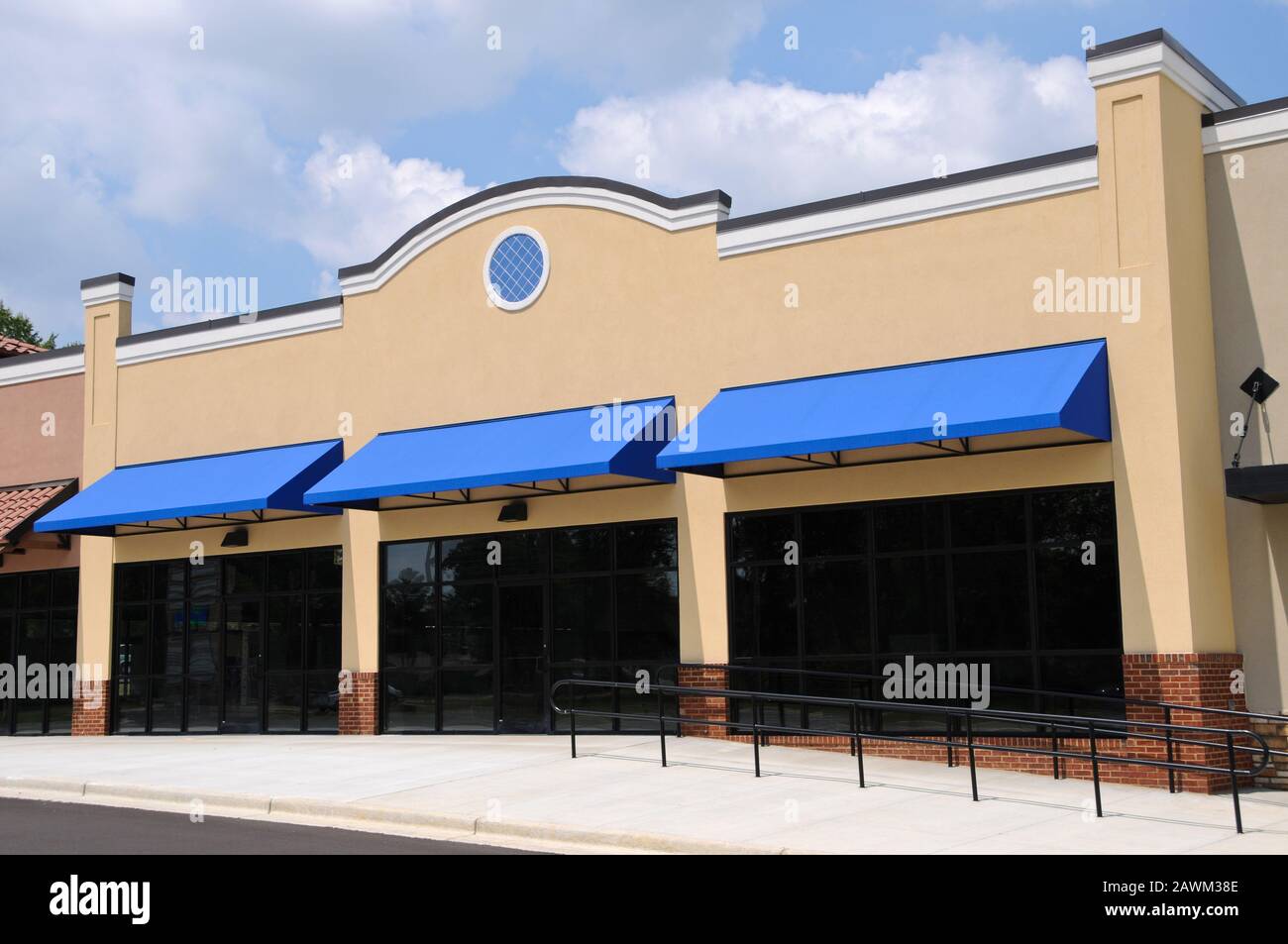 Store Front in a New Shopping Center Stock Photo - Alamy