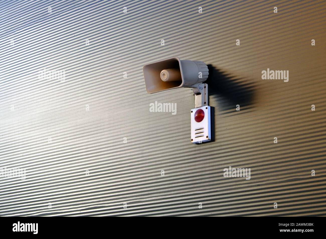 Megaphone for signaling in case of fire on the wall of a warehouse ...